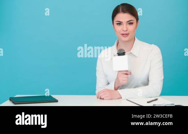 Beautiful girl tv newscaster with pretty smile reports Stock Video ...