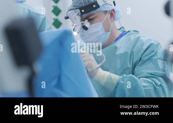 Operation of removing tonsils. tonsillectomy under deep anesthesia ...