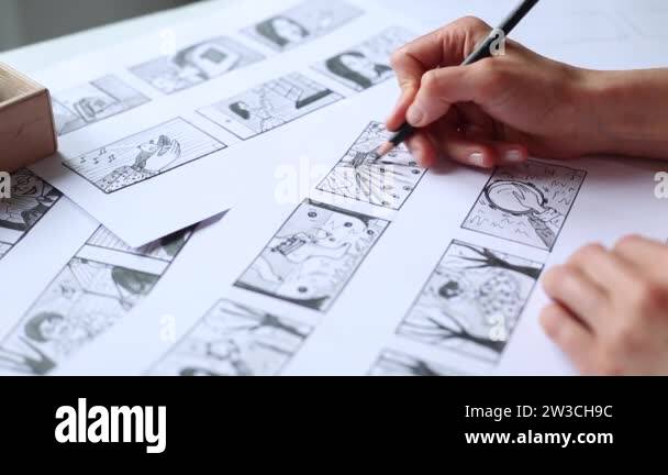 Hands of the artist designer draw a storyboard on paper. Storytelling ...