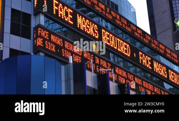 A fictional Times Square stock market ticker reminds pedestrians to ...