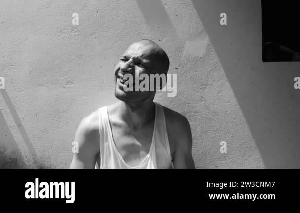 Young positive skinny anorexic bald happy smiling homeless man sitting ...