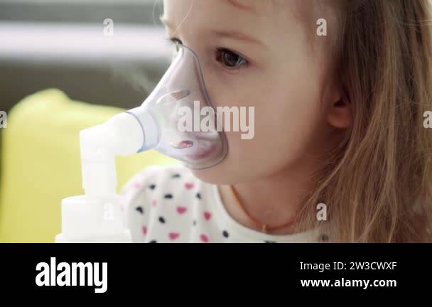 close up Caucasian 3-4 years minor preschool girl kid in the mask of an ...