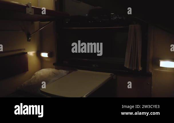 Inside compartment of corridor coach of railway passenger train. Empty ...