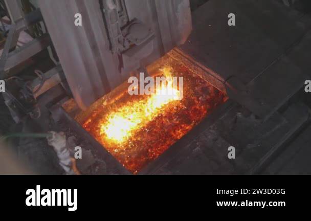 The furnace with molten metal, the melting of copper in the furnace ...