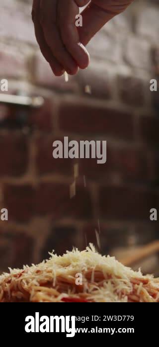 Sprinkling cheese Stock Videos & Footage - HD and 4K Video Clips - Alamy