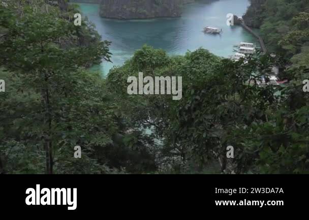 Kayangan Lake viewpoint of bay panning up hand held shot 60fps 1080p ...