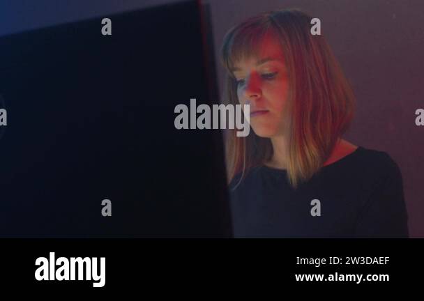 Woman Hacker programmer is working on computer in cyber security center ...