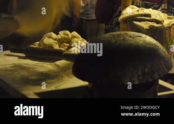 Indian baker preparing naan Stock Videos & Footage - HD and 4K Video ...
