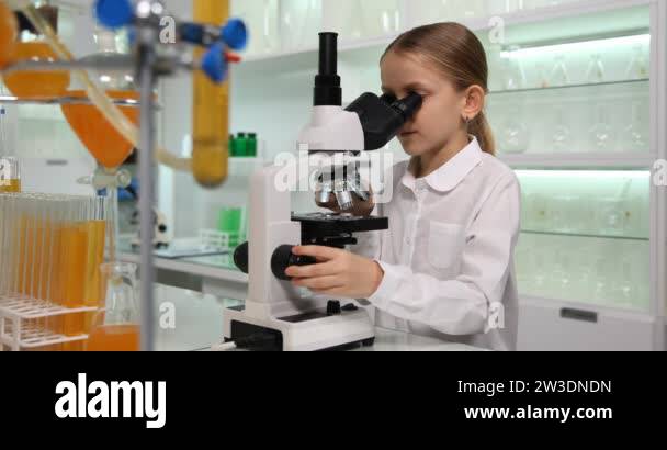 Kid Using Microscope in School Chemistry Laboratory, Student Child ...