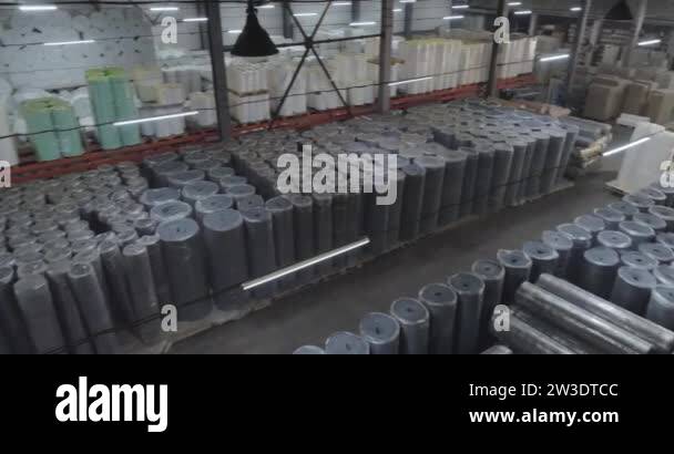 Forklift in a warehouse of synthetic materials. A forklift rides ...