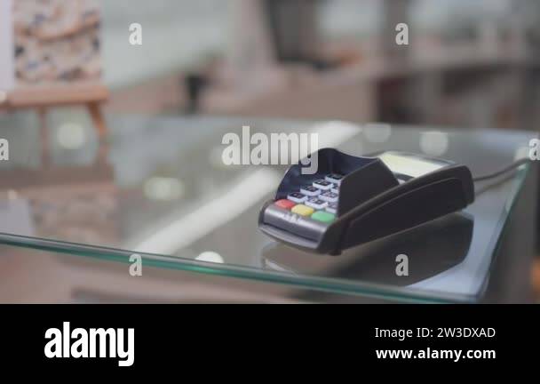 A man with a prosthetic arm uses a smartwatch. Pays for the purchase ...