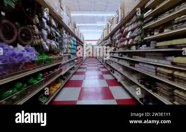Supermarket shopping pov action camera motion in the row of the store ...