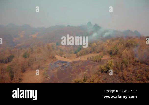 Smog of forest fires. Deforestation and Climate crisis in Asia. Toxic ...