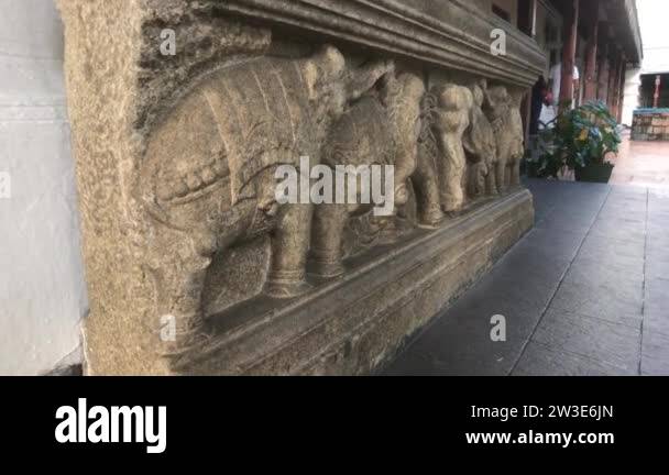 Kandy, Sri Lanka, November 25, 2019, Sri Dalada Maligawa stone figures ...