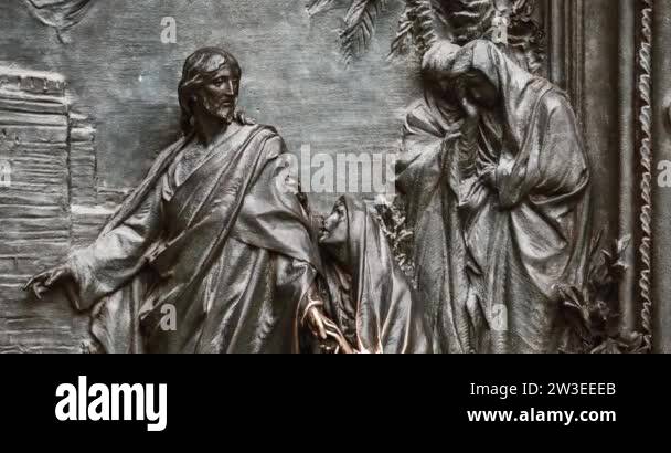 Statues of crusified Jesus and two criminal bandits filmed in close up ...