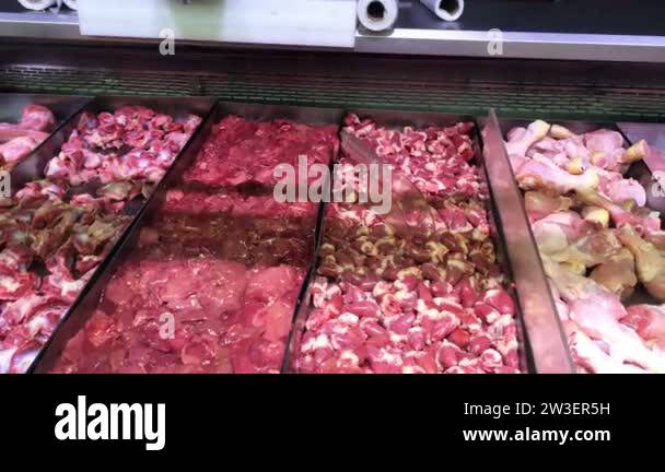 Different parts of raw chicken meat, chicken heart, leg, fillet, and ...