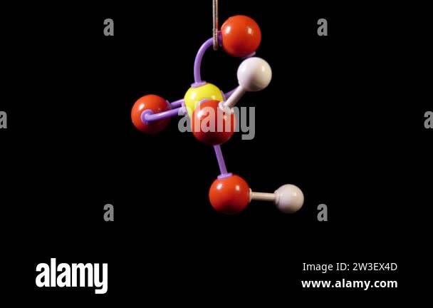 Chemical Formula of a molecule rotating isolated on a black background ...