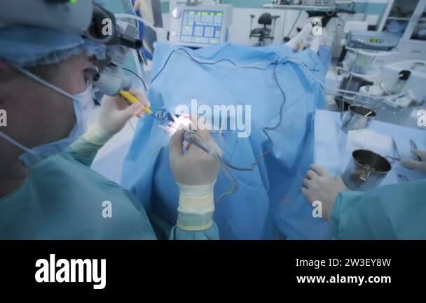 Operation of removing tonsils. tonsillectomy under deep anesthesia ...