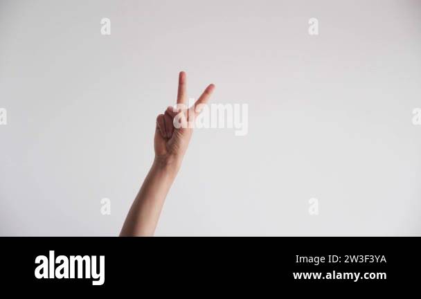 Counting at fingers concept. Closeup view of kid hand with showing 1, 2 ...