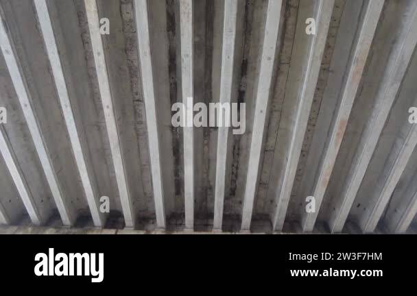 under the big bridge. Powerful iron bridge structure, View from below.A ...