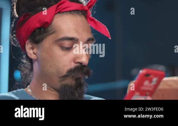 The Hindu with dreads, moustaches, a long beard and a red handkerchief ...