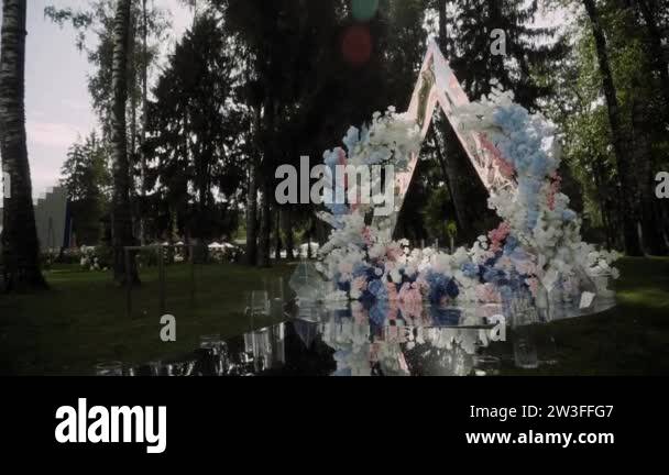 triangular arch for registration. White benches stand in two rows Stock ...