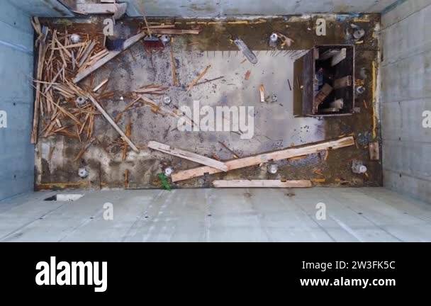 Dump with construction waste in unfinished abandoned high rise ...