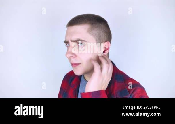 A man whose ear is bleeding. Vascular rupture, damage to the tympanic ...