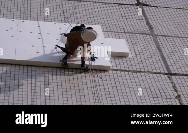 Industrial Climber Insulation of Facade Old High-Rise Building Using ...