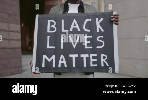 African american male hands holding carton placard with black lives ...
