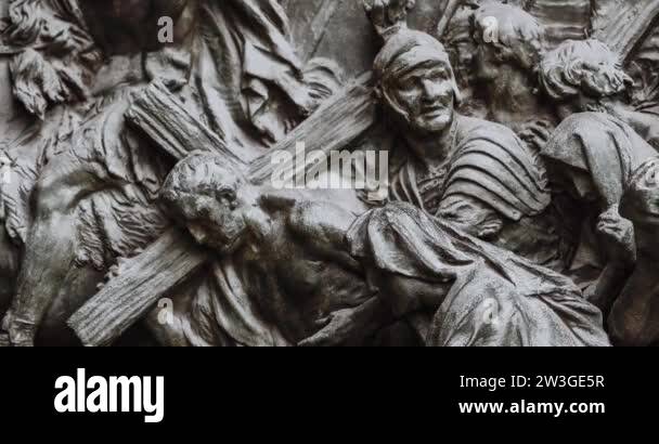 Statues of crusified Jesus and two criminal bandits filmed in close up ...