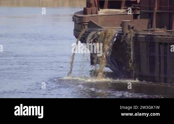 Dirty water flows into the river. Concept of water pollution from ...