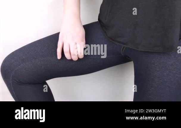 A woman suffers from pain in the inner thigh. The concept of treating a ...