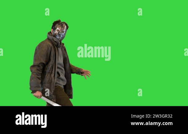Jason Voorhees looking at camera and waving machete on a Green Screen ...