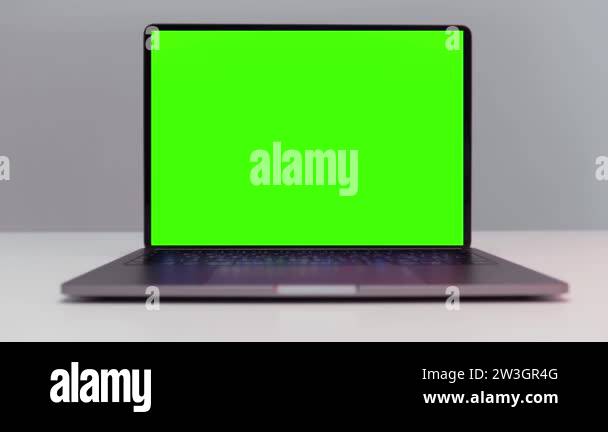 Close up of a new laptop computer with chroma key monitor. Action ...