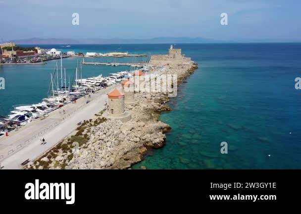 Mandraki port with deers statue, where The Colossus was standing and ...