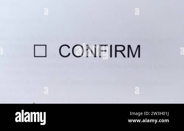 CONFIRM of check mark on white paper background Stock Video Footage - Alamy
