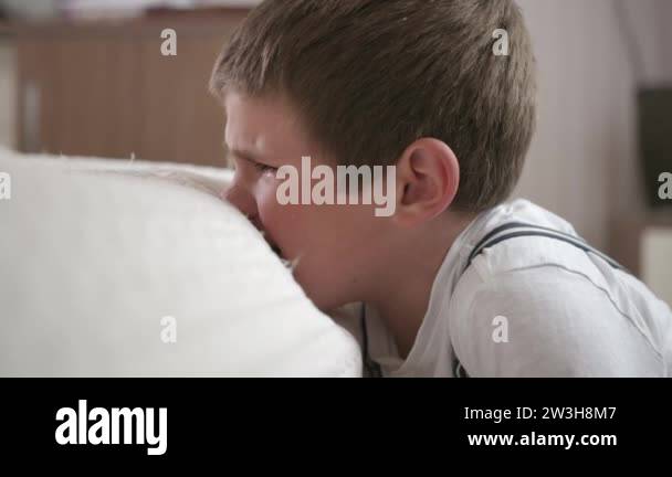 difficult parenthood, nervous crying boy suffers from nervous upset and ...