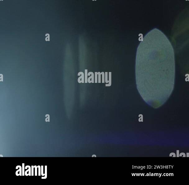 Techy blue optical lens flares transition that is a seamless loop with ...