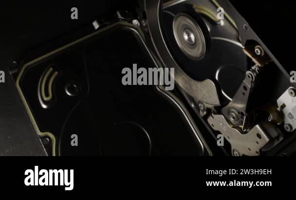 Inner working of Hard Disk, spinning Hard Drive open. Components of ...