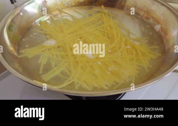 Pasta Boiled In Boiling Water In A Pan. Italian Cuisine. Close Up ...