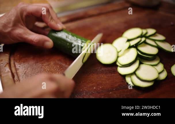 Cutting courgettes Stock Videos & Footage - HD and 4K Video Clips - Alamy