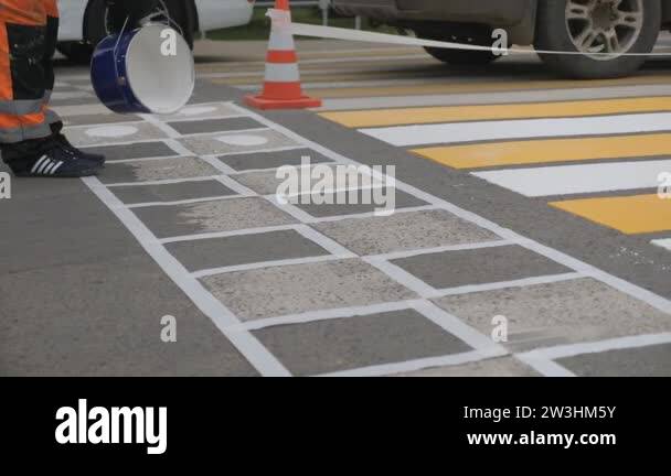 Road markings. Marking of a pedestrian crosswalk on a motorway ...
