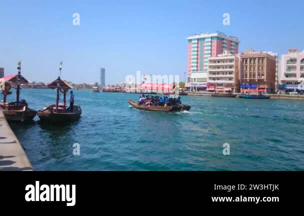 DUBAI, UAE - MARCH 8, 2020: Traditional wooden abra boats float through ...