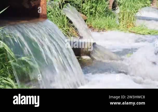 Drain water through the drain pipe. Bubbling water of the waste water ...