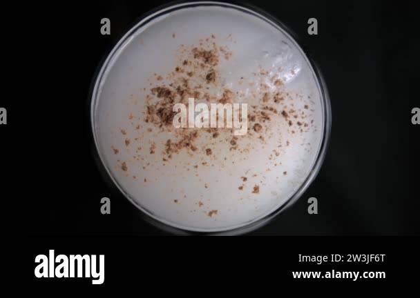 Glass of traditional Mexican horchata water with black background Stock ...