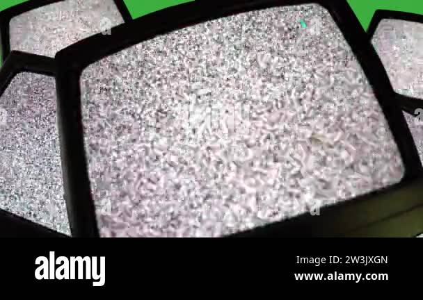 Stacked old TVs on green background, many vintage televisions with ...