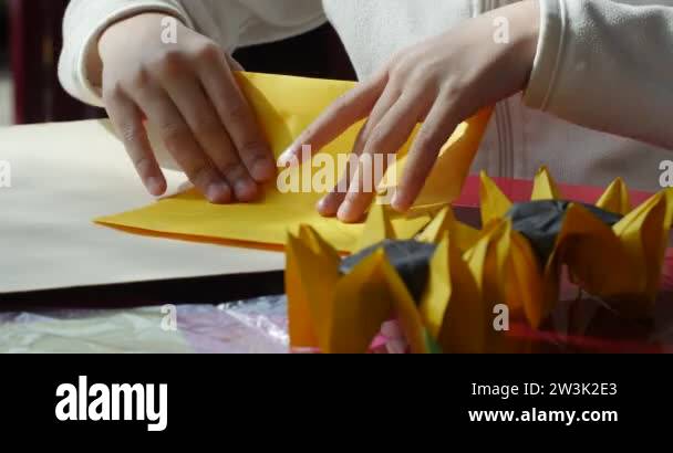 Kid Makes Sunflower From Colored Paper Two Paper Sunflowers On Table ...