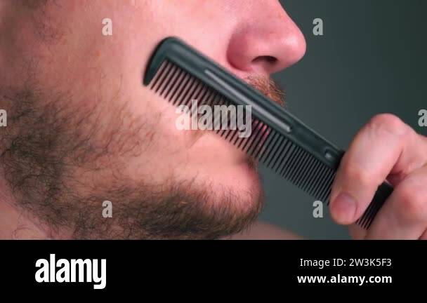 Man combing beard close up Stock Videos & Footage - HD and 4K Video ...