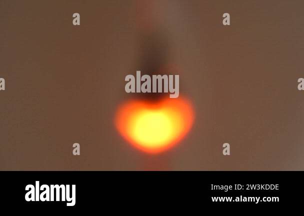 The diffuse glow of a gas discharge lamp is often used as a background ...